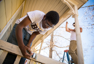 A UW student participates in a community service event